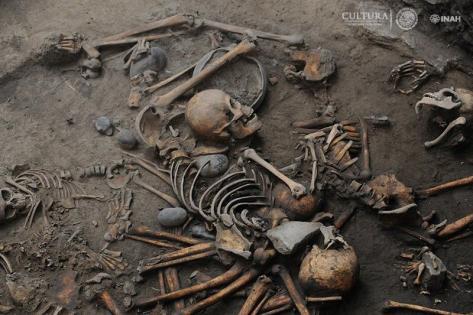 Spiral circle of linked human skeletons discovered at Pre-Aztec burial ...
