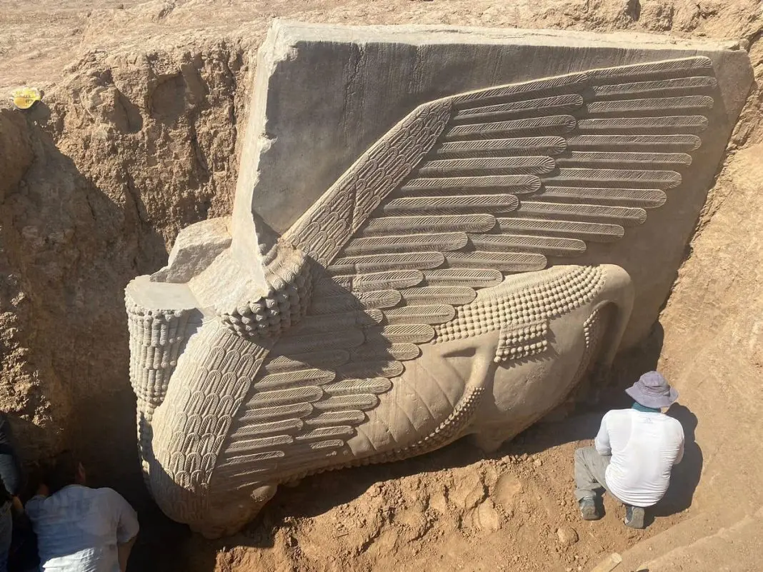 Archaeologists excavate a lamassu at ancient Khursbad