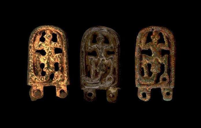 Archaeologists uncover a bronze belt fitting from an unknown pagan cult