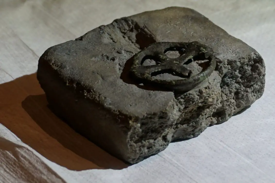 Rare wheel cross discovery provides new evidence for early Christianisation